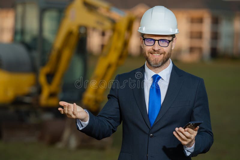 Civil Engineer Worker at a Construction Site. Mature Engineer Worker ...
