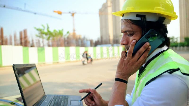 Engineer Working at Programmable CNC Machine in Factory Industries ...
