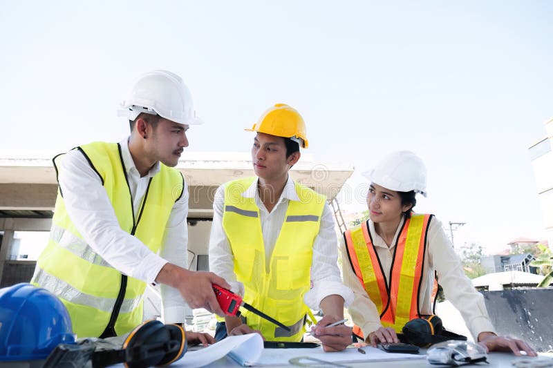 Civil Engineering Team Meets To Plan Work on Construction Project in ...