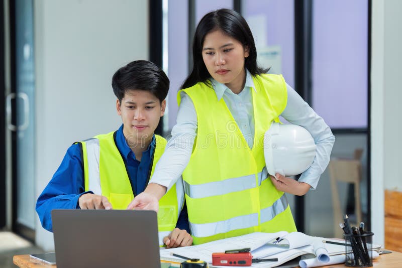 Civil Engineers and Architects Discuss Project Construction Together on ...