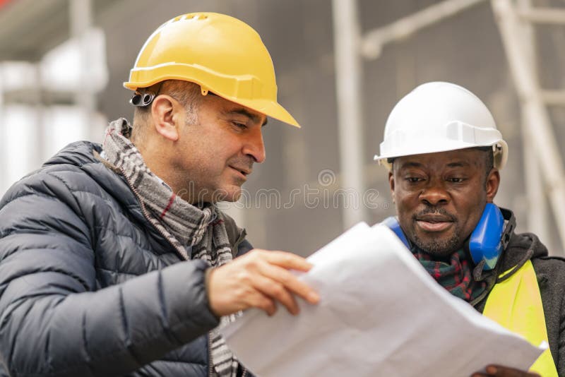 Civil Engineers Working on Construction Site Stock Image - Image of ...