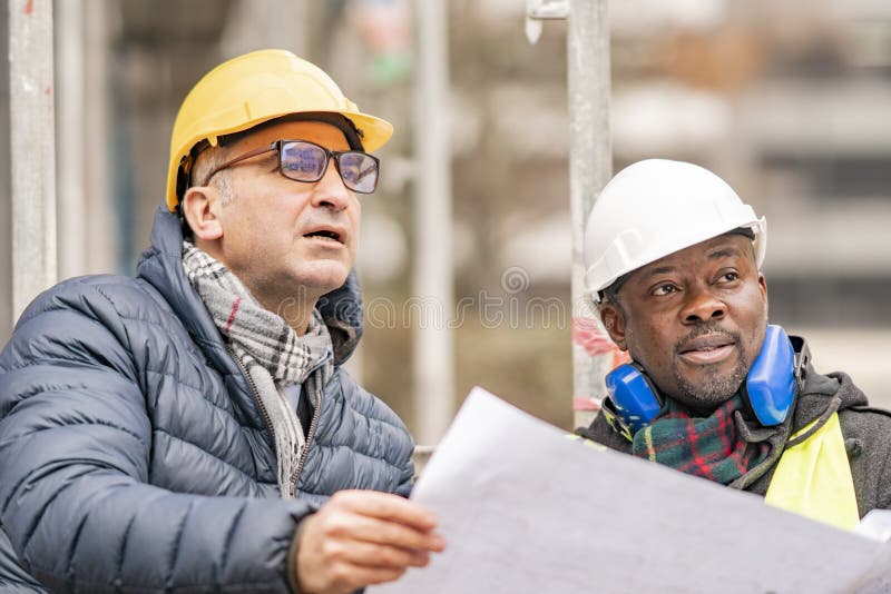 Civil Engineers Working on Construction Site Stock Photo - Image of ...