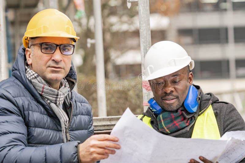 Civil Engineers Working on Construction Site Stock Photo - Image of ...