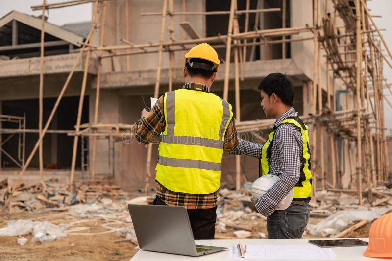 Civil Engineers Inspect Work with Walkie-talkies for Communicating with ...