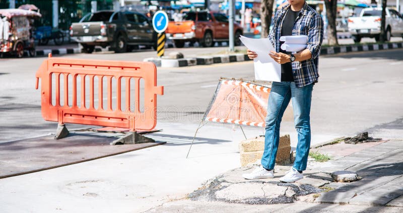 Civil Engineers Work According To Road Conditions and Have Barriers ...