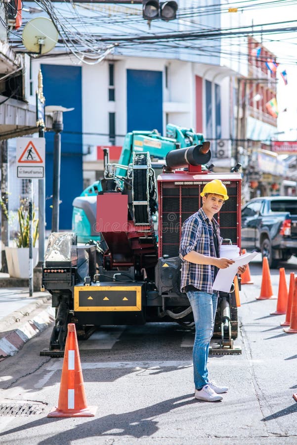 Civil Engineers Work on Large Road and Machinery Conditions Stock Photo ...