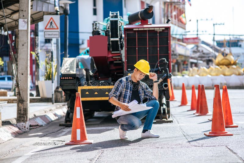 Civil Engineers Work on Large Road and Machinery Conditions Stock Photo ...