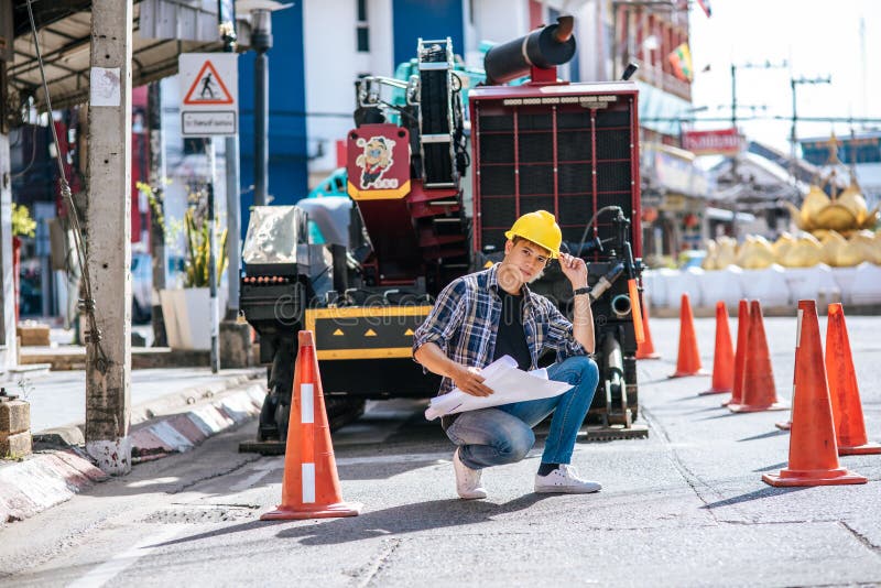 Civil Engineers Work on Large Road and Machinery Conditions Stock Photo ...