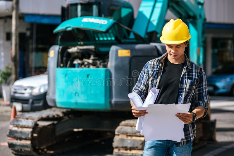 Civil Engineers Work on Large Road and Machinery Conditions Stock Photo ...