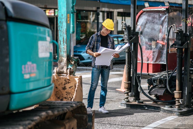 Civil Engineers Work on Large Road and Machinery Conditions Stock Image ...