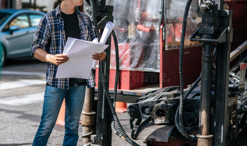 Civil Engineers Work on Large Road and Machinery Conditions Stock Photo ...
