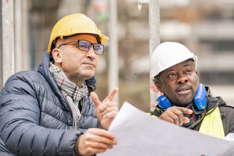 Civil Engineers Working on Construction Site Stock Photo - Image of ...
