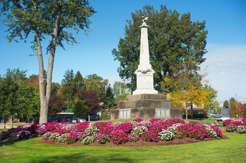 Civil War Memorial and Flowers on a Town Square Editorial Image - Image ...