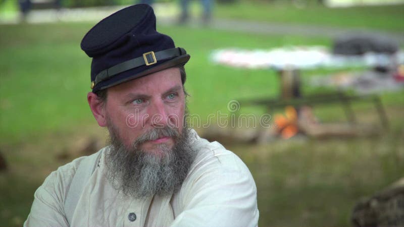 Civil War Soldier in Uniform Resting Against a Tree during the 1860s ...