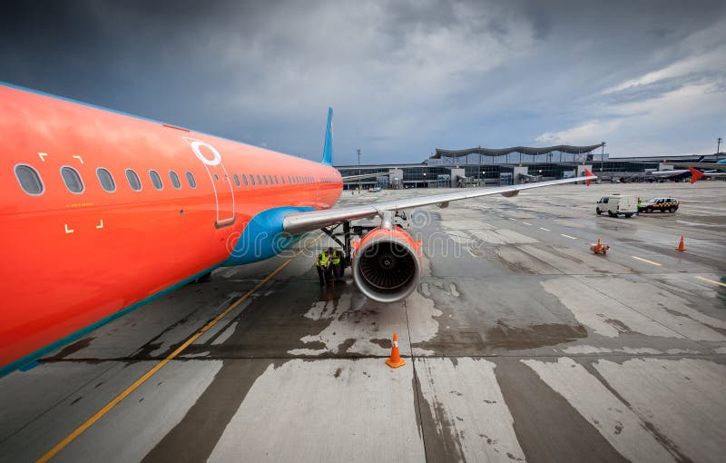 Civilian Airliner with Jet Engine on Runway at Storm Stock Photo ...
