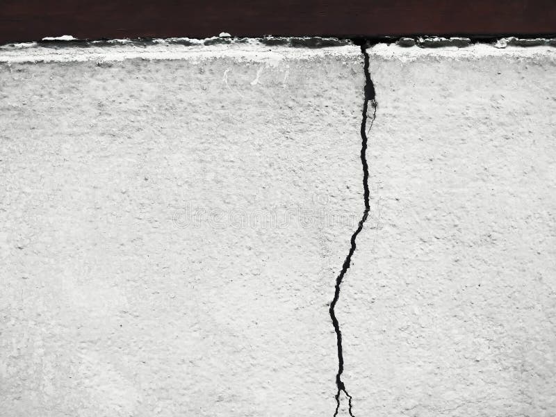 Clacked gray cement wall stock photo. Image of detail - 140795260
