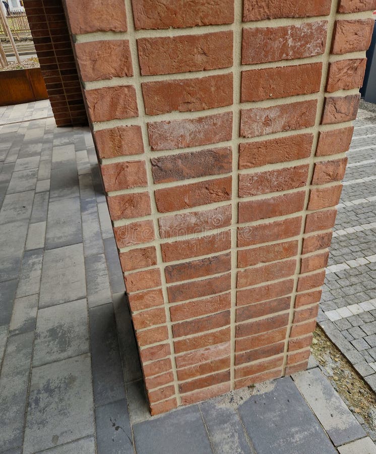Cladding the House and Columns Using Textured Bricks in Rows One Stock ...