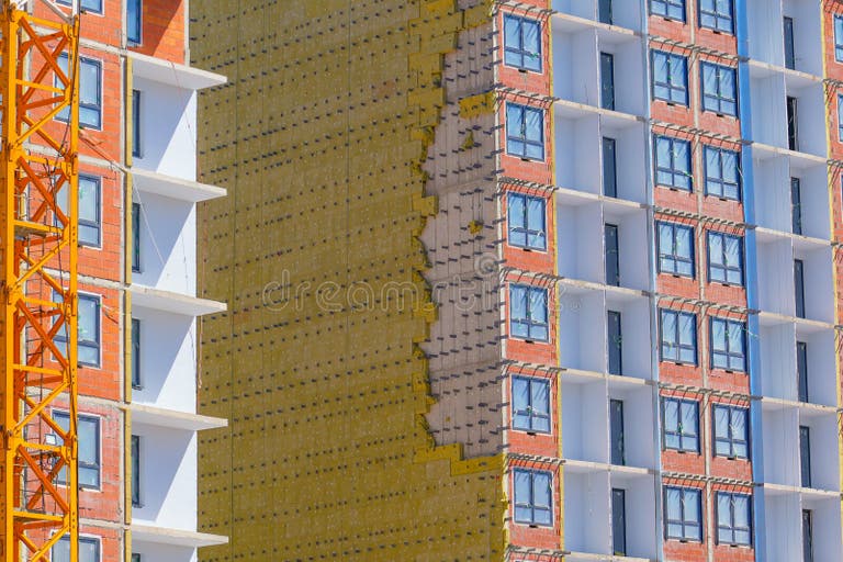 Cladding and Warming Wall of Monolithic House Under Construction ...