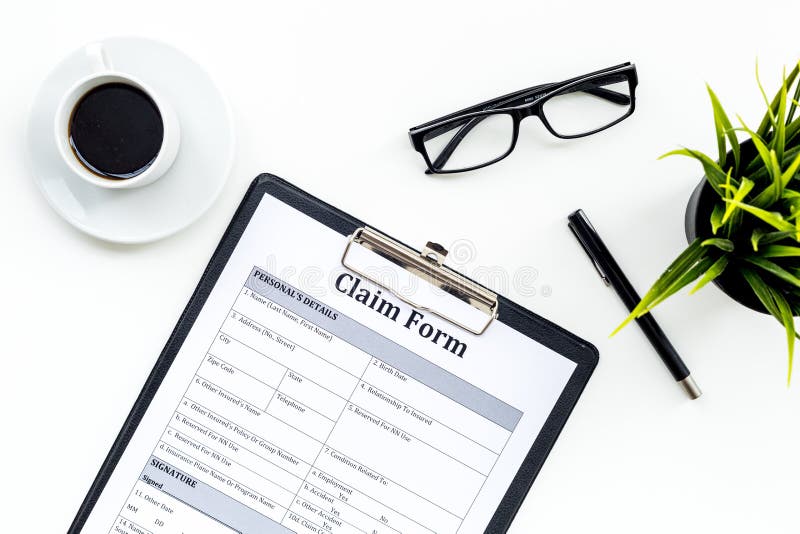 Claim Form To Fill Out on White Desk Top View Stock Photo - Image of ...