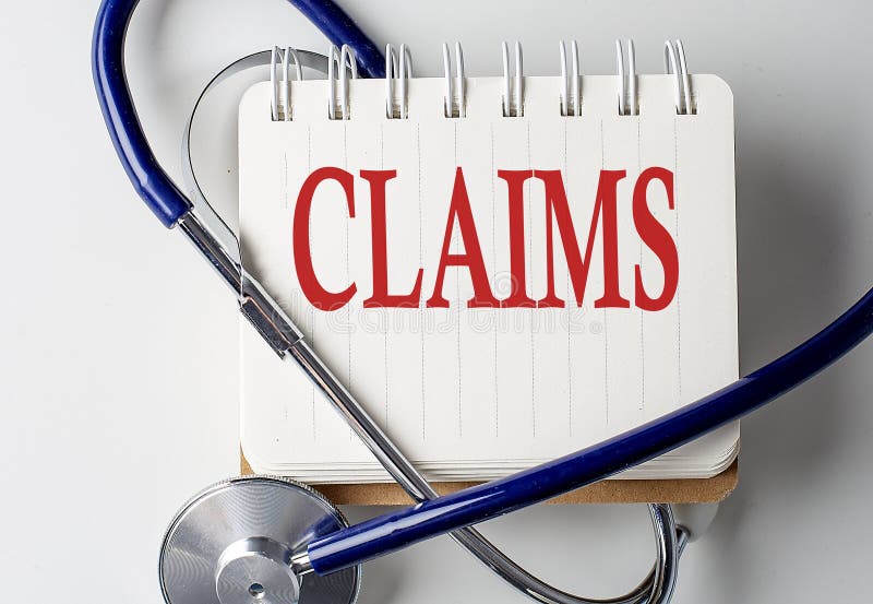 CLAIMS Word on Notebook with Medical Equipment on Background Stock ...