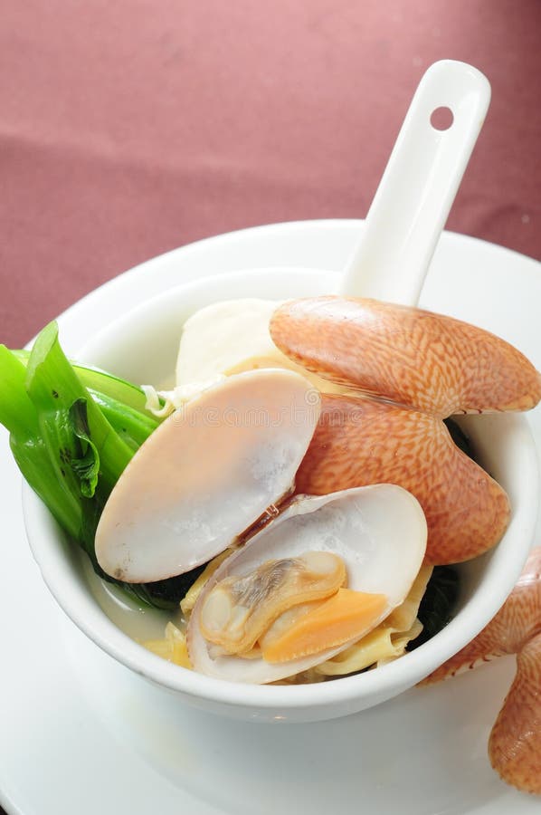 Shell Soup with Garlic, Chilli , Mint and Basil. Traditional Northeast ...