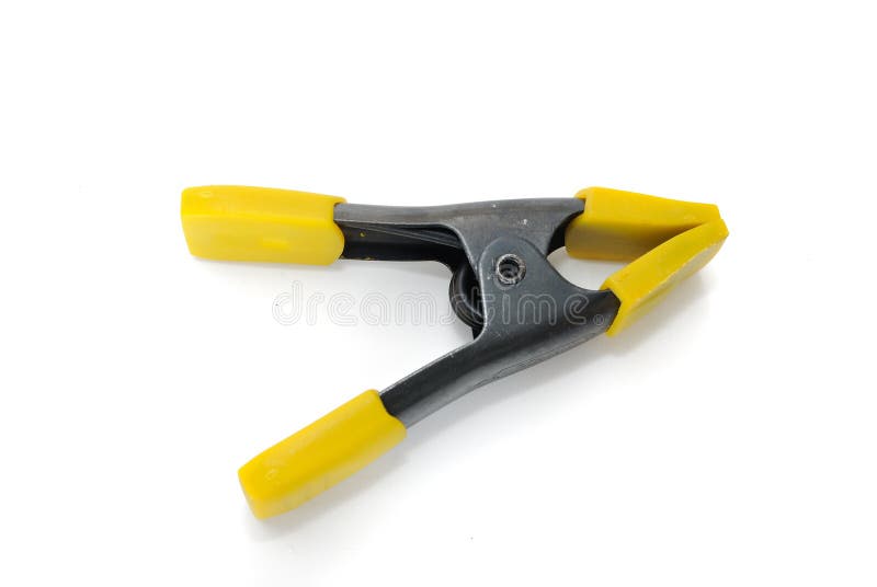 Yellow Clamps stock photo. Image of hand, close, compress - 8504006