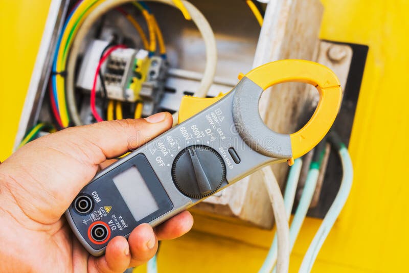 Clamp Amp Meter, Hand of Electrician with Clamp Amp Meter Stock Photo ...