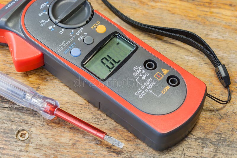 Clamp Multimeter with Accessories on a Table in a Workshop Stock Image ...