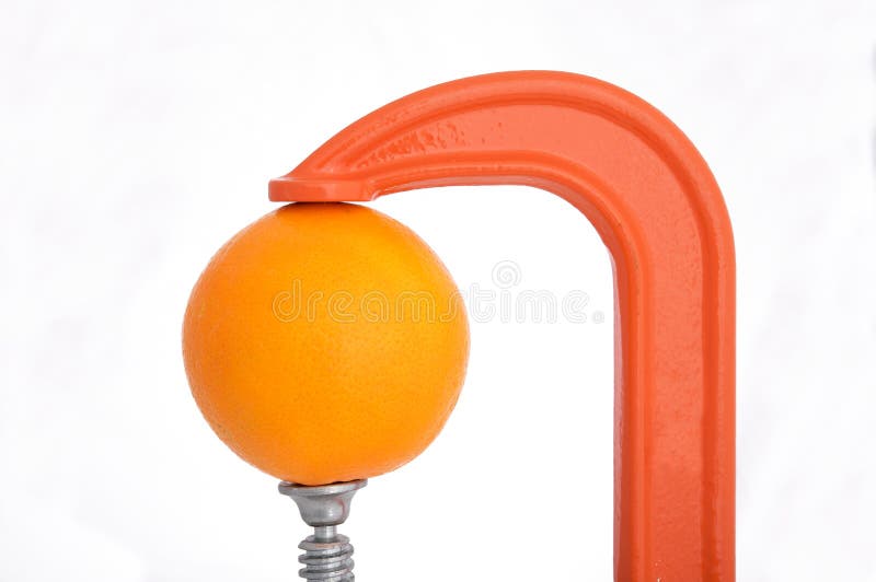 Orange in C Clamp stock image. Image of construction - 19409013