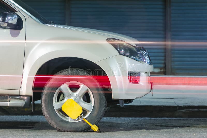 Clamped Front Wheel. Wheel Locks, Concept of Car. Stock Photo - Image ...