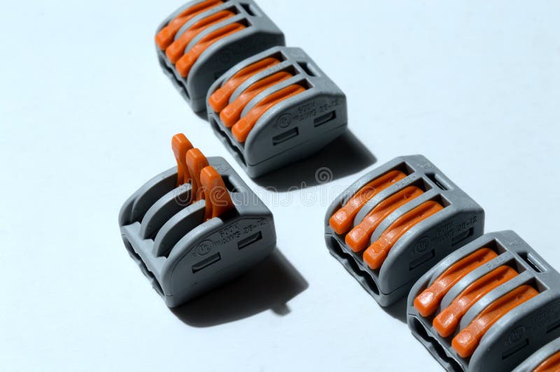 Clamping Terminal Blocks Lie on a Light Background. Close-up Stock ...