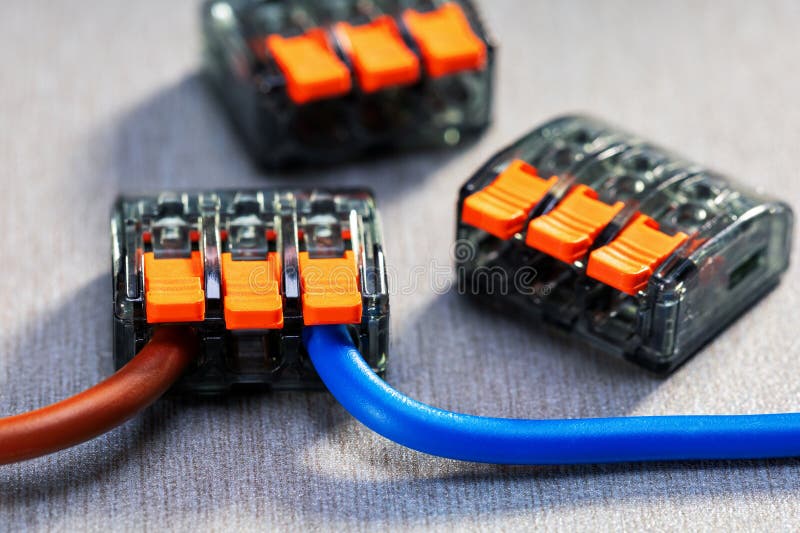 Clamping Terminal Blocks with Wire on Grey Surface. Stock Photo - Image ...
