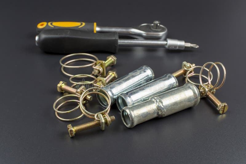 Metal Wire Clamps and Tools on Black Background Stock Photo - Image of ...