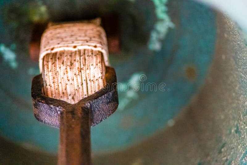Clapper of ancient bell stock photo. Image of cathedral - 130271668