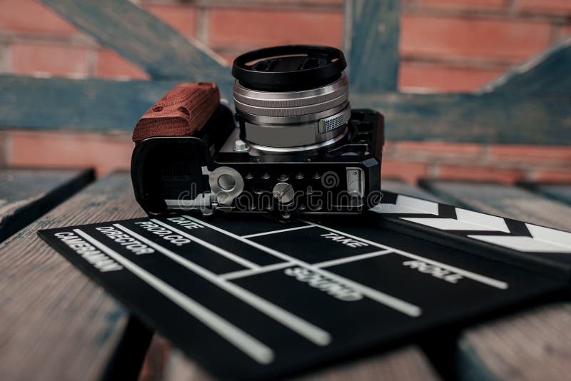 Clapper board and camera stock photo. Image of direct - 221598464