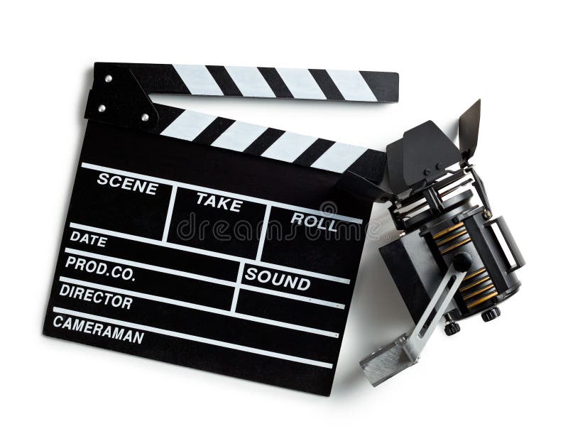 Clapper Board with Movie Light and Film Reels on Wooden Table Stock ...