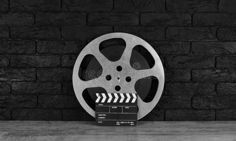 Clapperboard and Reel with Film on Table Stock Photo - Image of ...