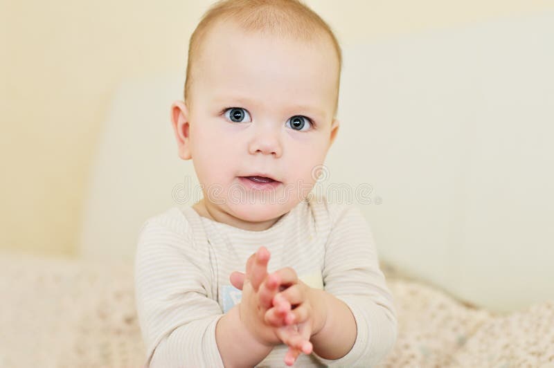 Clapping baby stock photo. Image of looking, alone, face - 32346342