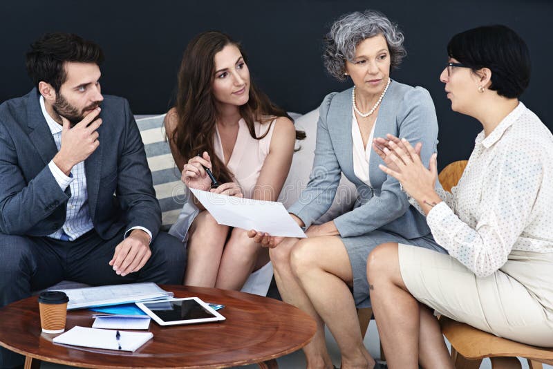 Clarifying Her Ideas. Businesspeople Having a Discussion in a Modern ...