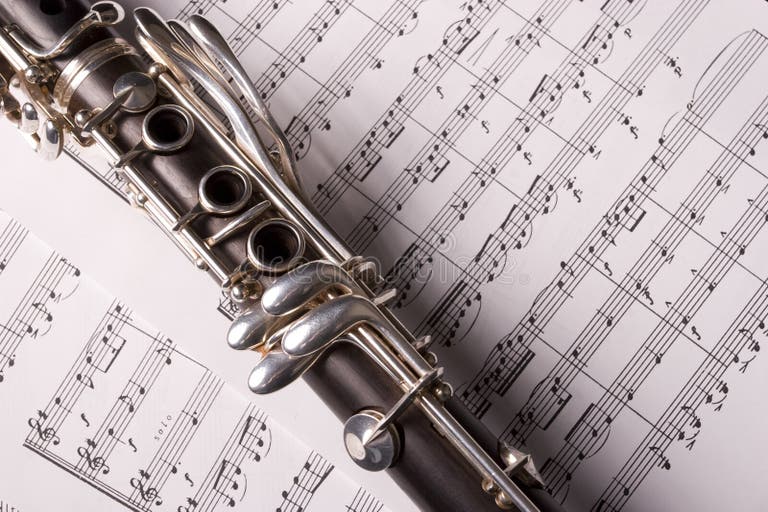 Clarinet Isolated Over Sheet Music Stock Photo - Image of paper, detail ...