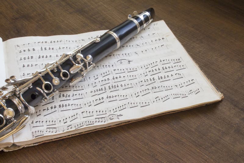 Clarinet and musical score stock photo. Image of melody - 60221142