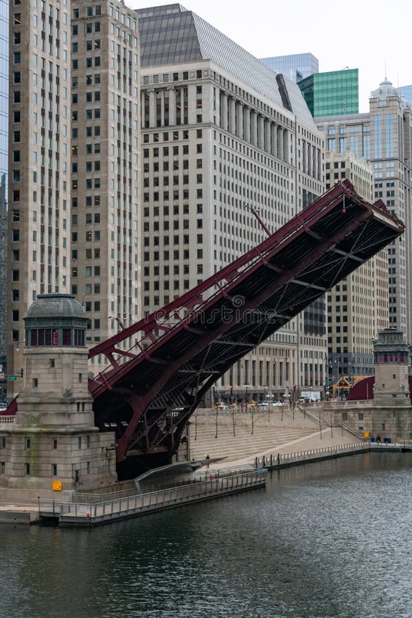 The Clark Street Bridge Raised Over the Chicago River with the Chicago ...