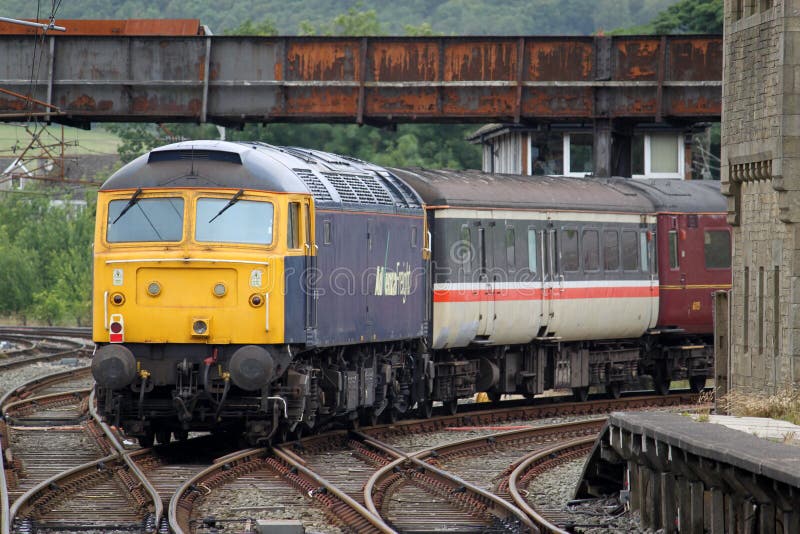Class 57 Diesel Locomotive Leaving Carnforth. Editorial Image - Image ...