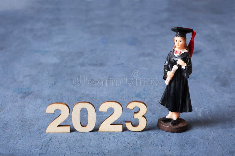 Class of 2023 Concept. Wooden Number 2023 with Graduate Statuette on ...