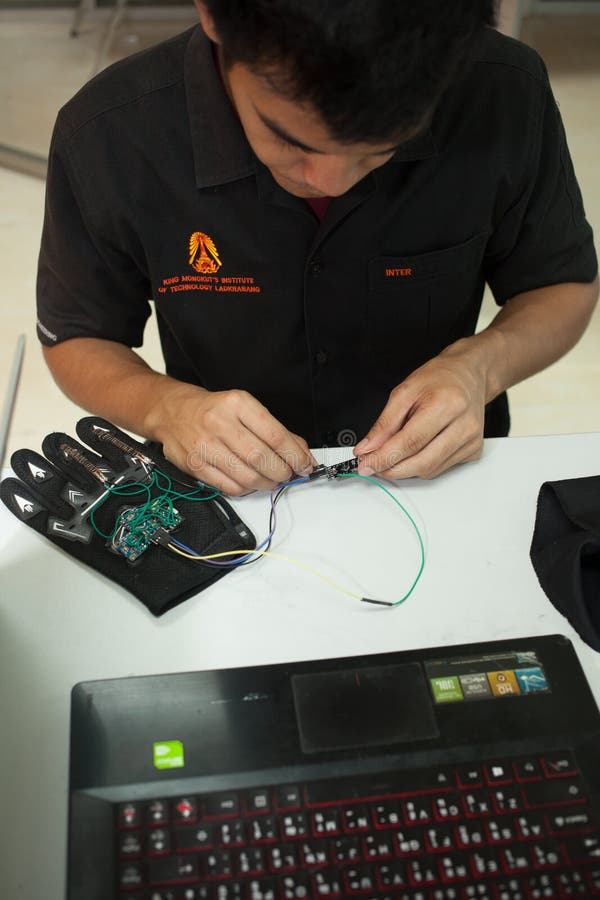 A Class of High School Students Study Electronics and Robotics ...