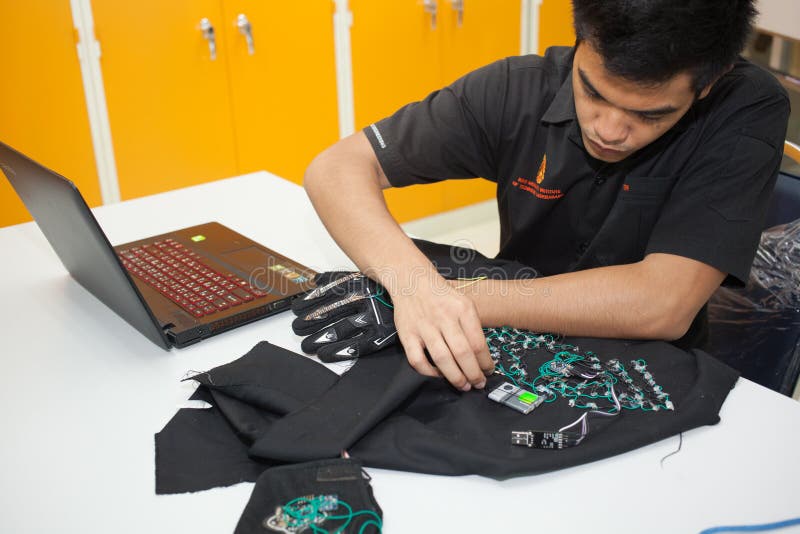 A Class of High School Students Study Electronics and Robotics ...