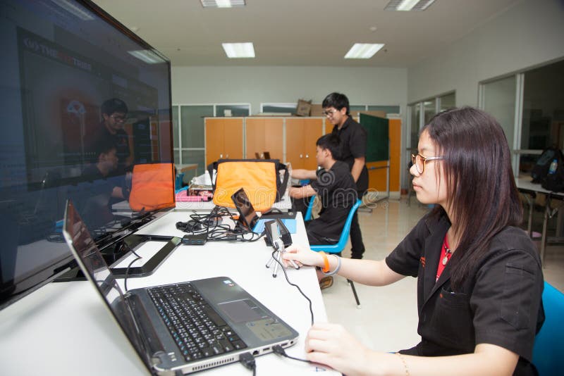 A Class of High School Students Study Electronics and Robotics ...