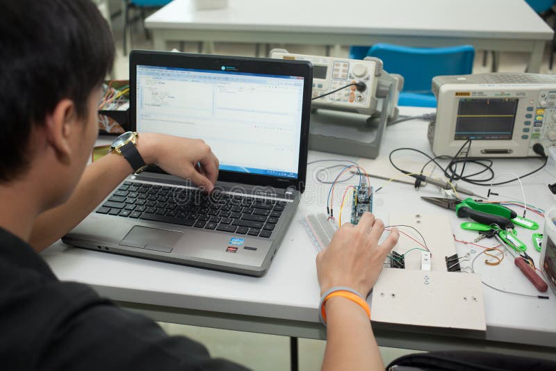 A Class of High School Students Study Electronics and Robotics ...
