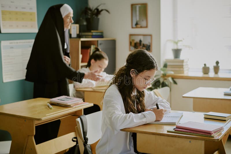 Nuns and Students Studying Religiously in Classroom Stock Image - Image ...