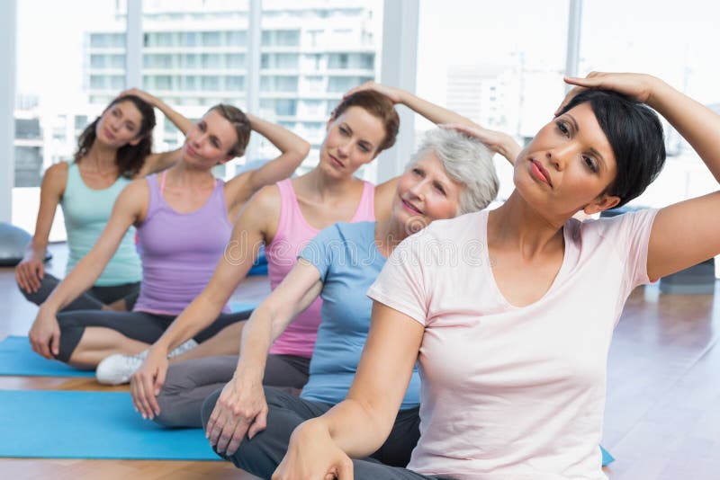 Class Stretching Neck in Row at Yoga Class Stock Photo - Image of five ...